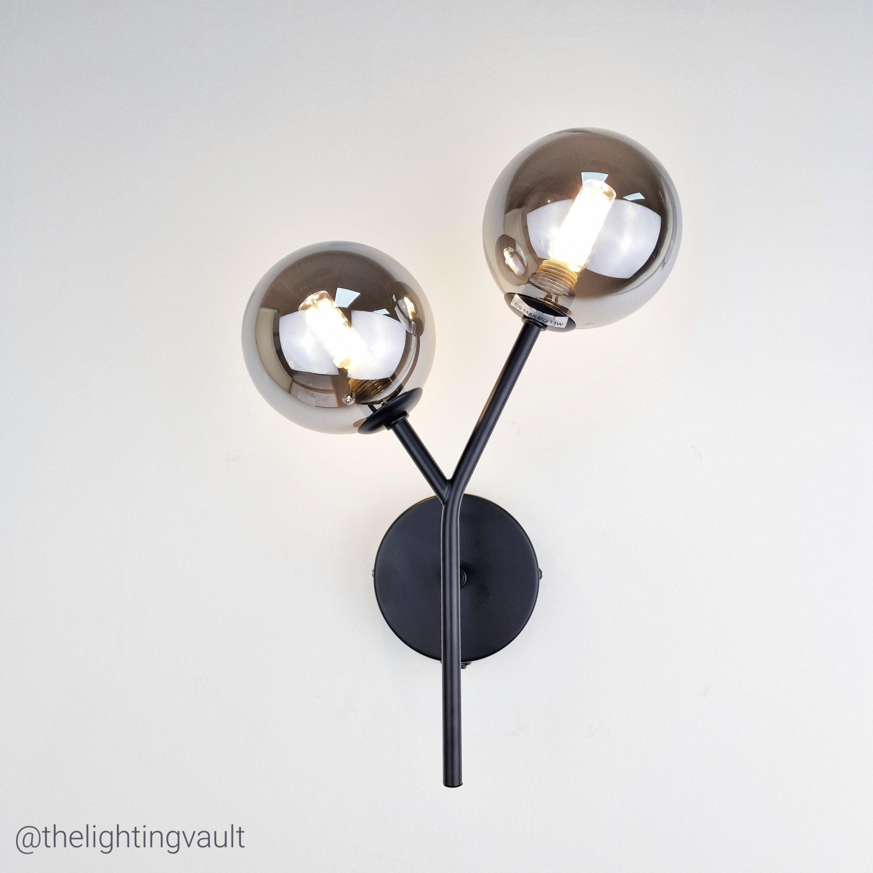 Modern switched double wall light in matt black finish – The Lighting Vault